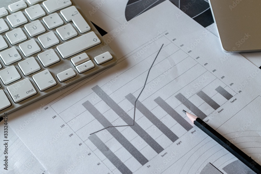 Notebook paper, Diagrams graphs and financial documents Finance concept ...