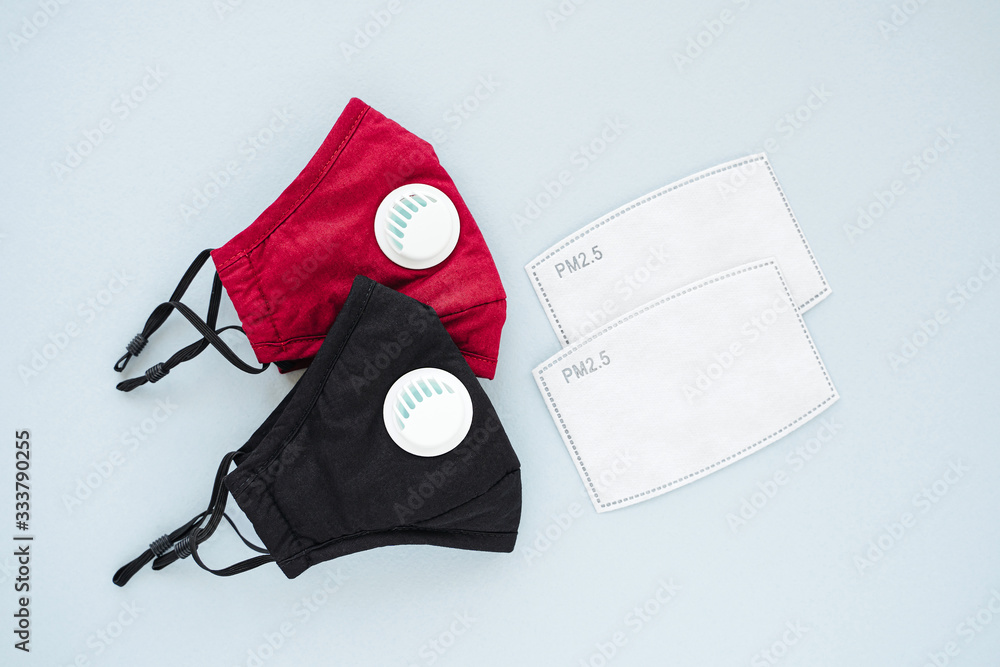 Foto de Stock Reusable antiviral masks with breather filter valve ...