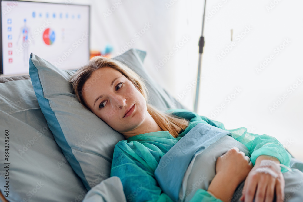 Infected patient in quarantine lying in bed in hospital, coronavirus ...