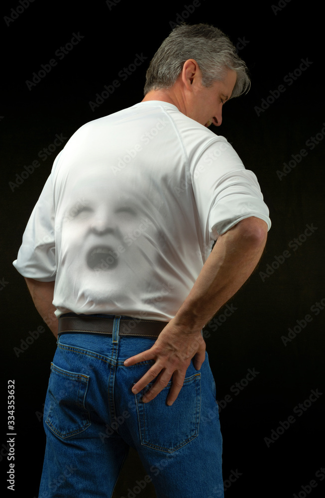 Man who threw his back out with a screaming backache visibly showing ...