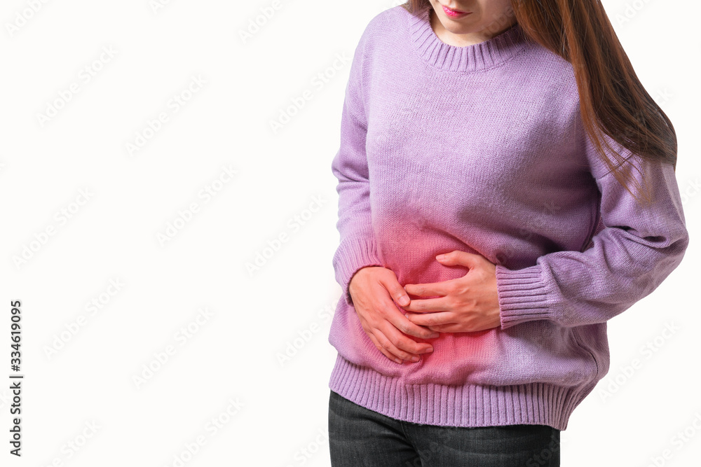 Asian woman having painful stomach ache and She used the hand to hold ...