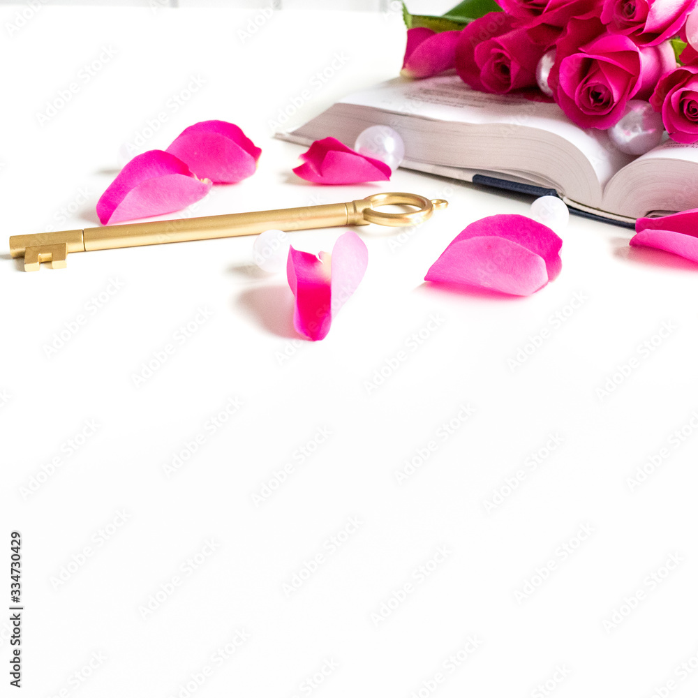Pink Bible flat lay: Pearls, pink rose petals, open book and golden key ...