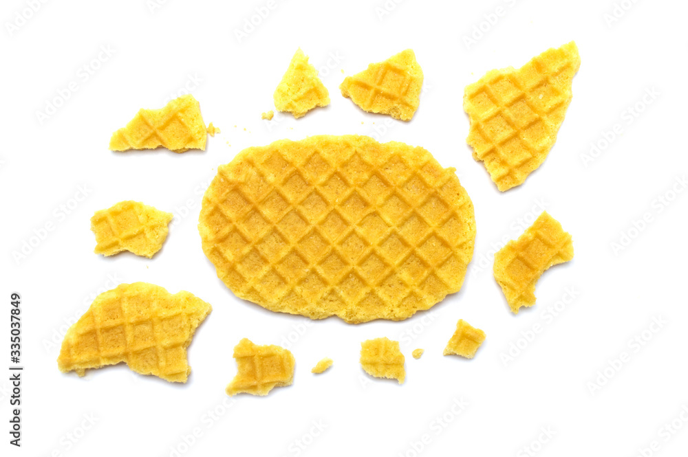 Waffle crisp wafer butter flavor biscuits and crumbs isolated on white ...