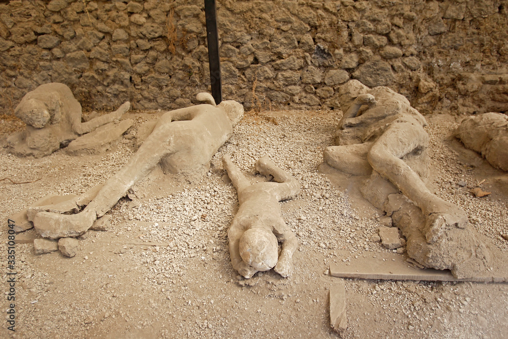 Plaster casts of bodies that were buried by the eruption in “The Garden ...