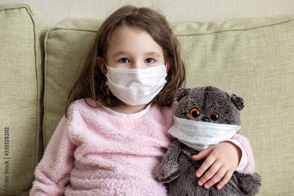 Funny kid with mask during COVID-19 coronavirus pandemic. Stay at home ...