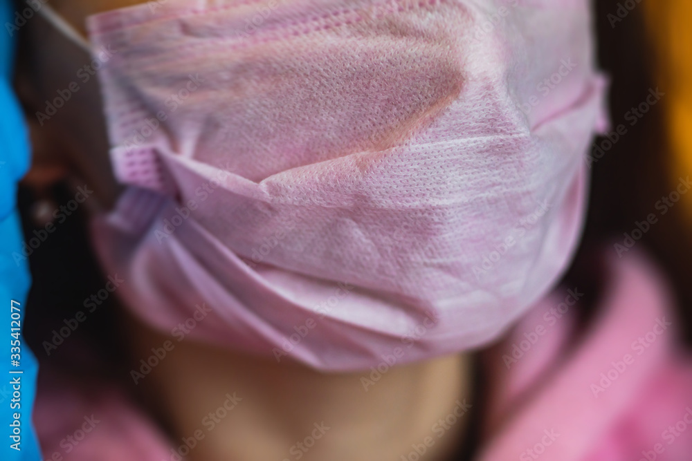 View of different coloured medical forensic face respirator mask, pink ...