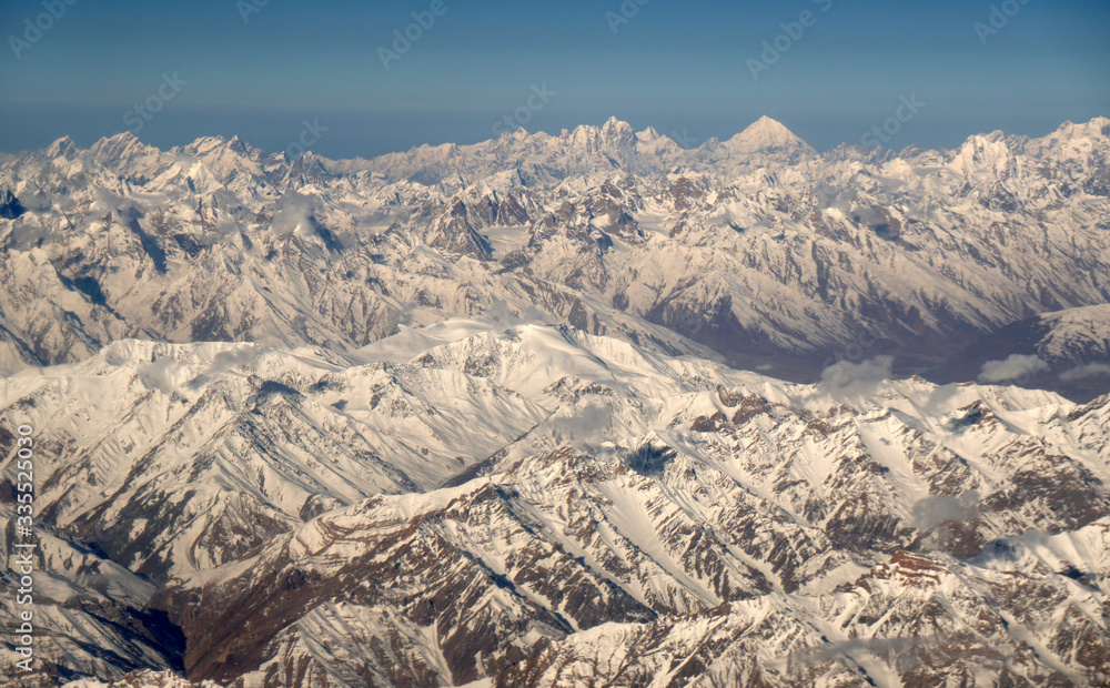Nature scene - Aerial top view of Snow Mountain of himalaya mountains ...