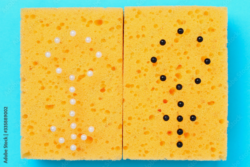Abstract signs of man and woman made by needles in sponges for washing ...