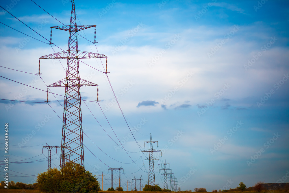 Group silhouette of transmission towers (power tower, electricity pylon ...