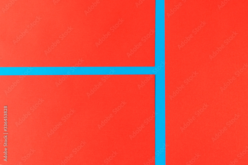Pattern of bright red and blue pieces of paper, with clear angles and ...