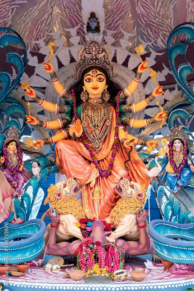 Idol of Goddess Devi Durga at a decorated puja pandal in Kolkata, West ...