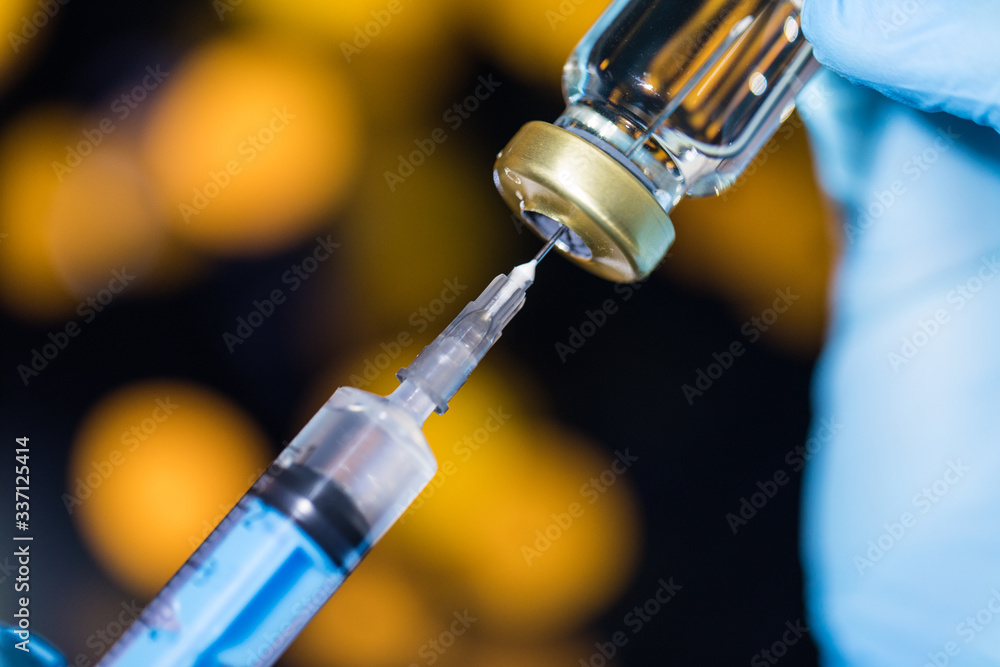 Close up vaccine vial dose flu shot drug needle syringe, medical ...