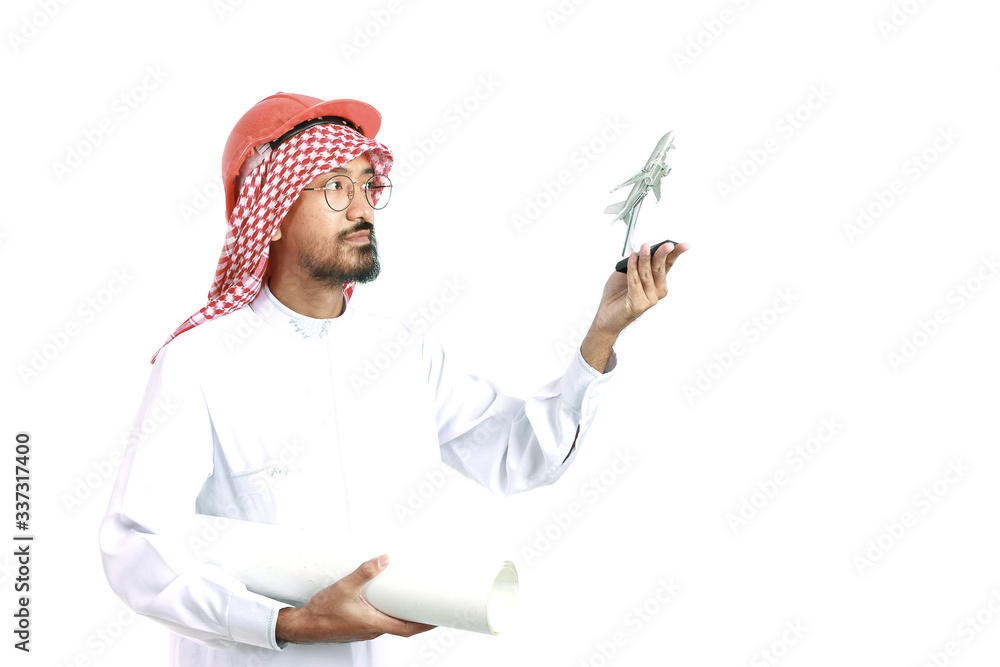 Arab man engineer portrait wearing keffiyeh, holding blueprint and ...