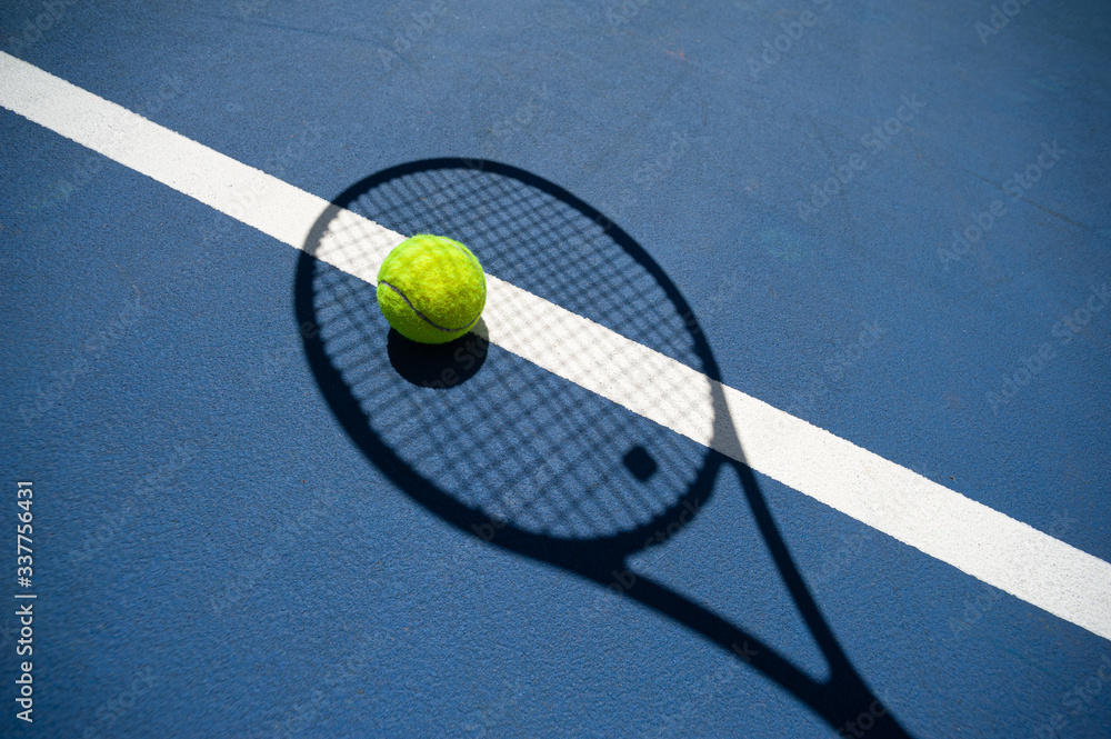 Stock-Foto „Shadow of a tennis racket and the tennis ball inside it ...