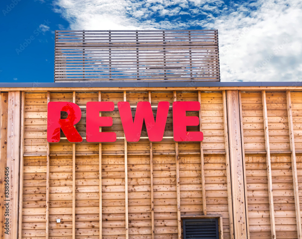 Foto de Stock Nurnberg, Germany: Rewe city supermarket signage. The ...