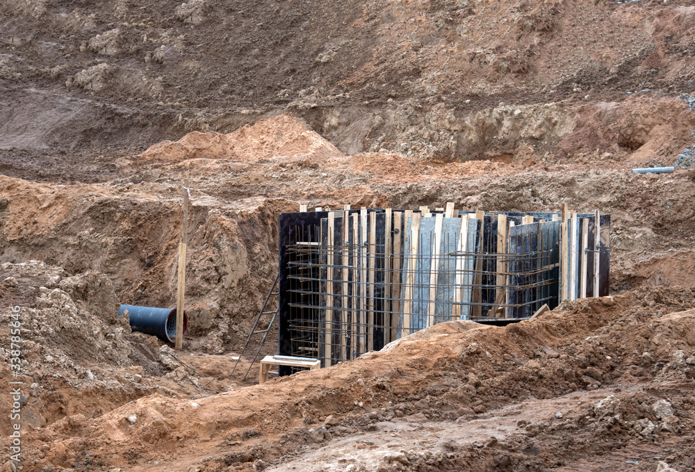 Connecting a trench drain to a valve pit and concrete chamber structure ...