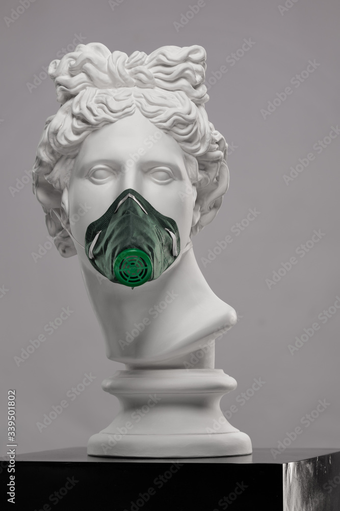 Bust of Apollo Belvedere in a mask respirator covering his face Stock ...