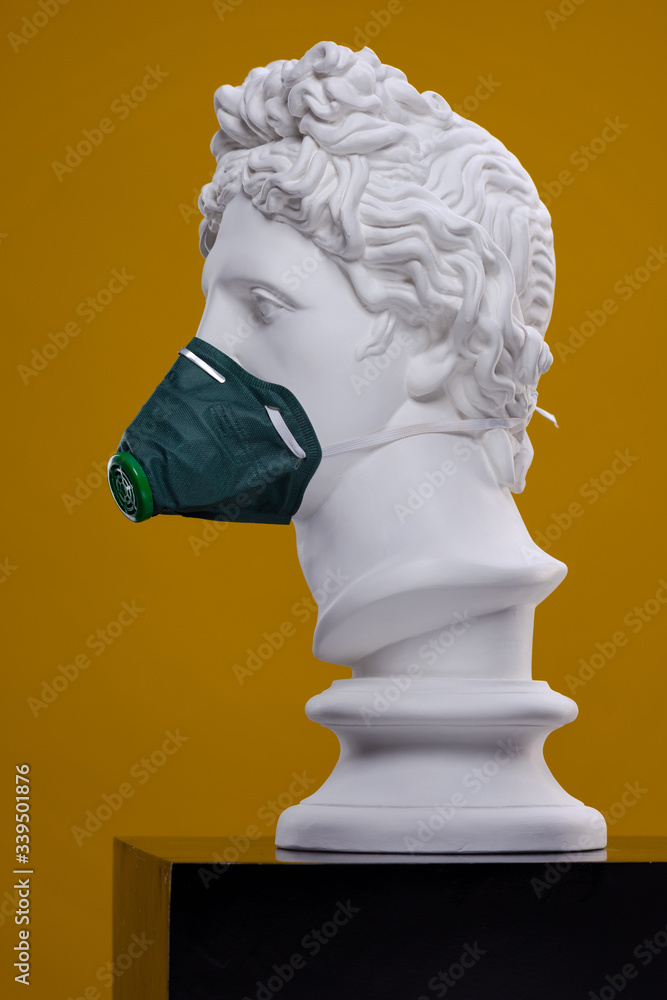 Bust of Apollo Belvedere in a mask respirator covering his face Stock ...