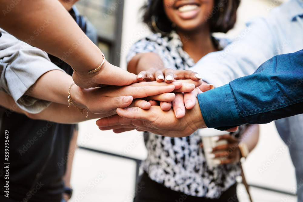 Diverse startup business team stacking hands Stock Photo | Adobe Stock