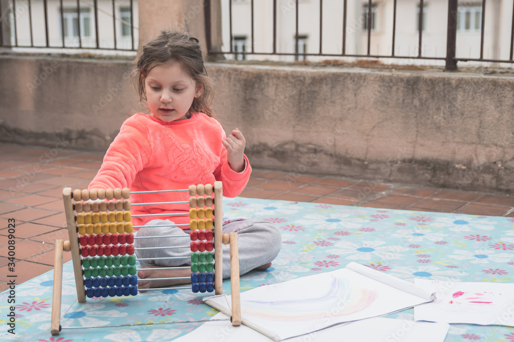 little girl learning to count Stock Photo | Adobe Stock
