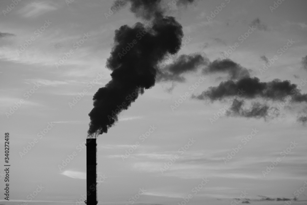 Black smoke from an industrial chimney as a symbol of environmental ...