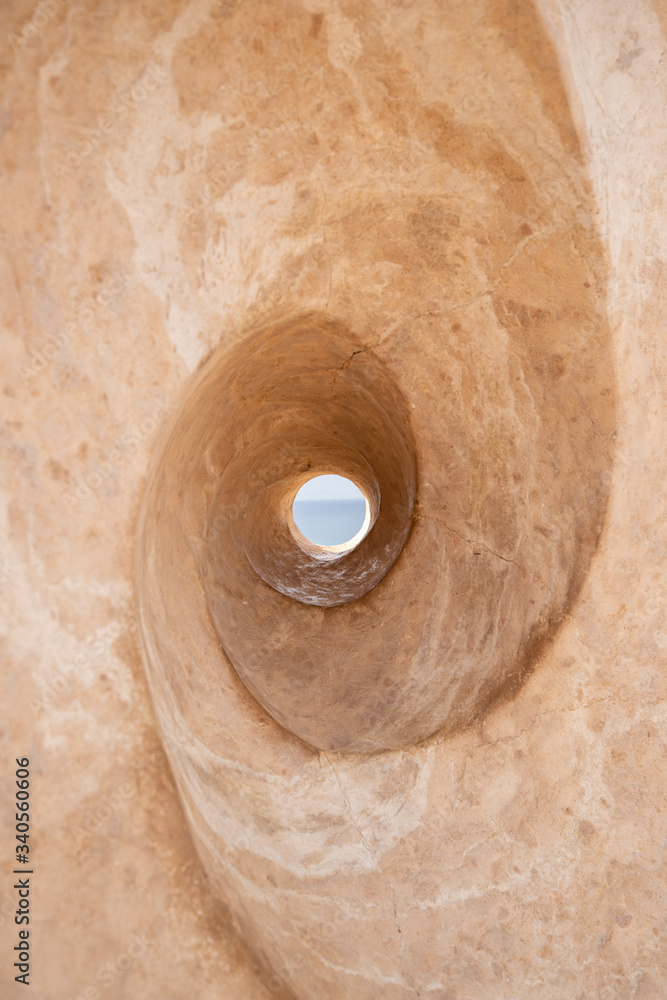 background image of a light beige stone texture, swirling spirals Stock ...