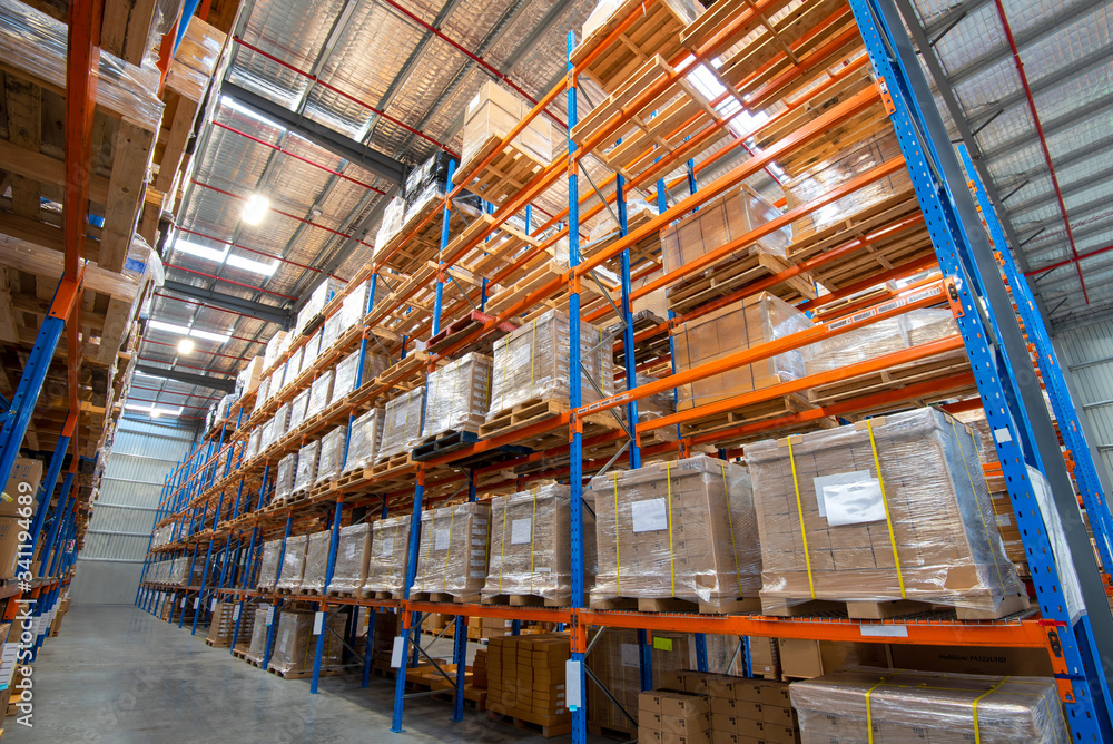 Shelf full of merchandise at logistics warehouse Stock Photo | Adobe Stock
