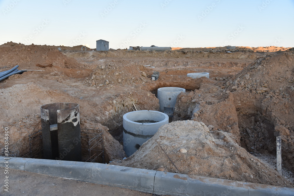 Laying concrete manholes and heating drain pipes and for stormwater ...