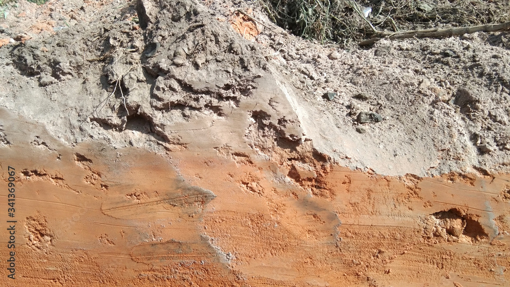 sandy soil layer, trace and color of sandy soil layer caused by ...