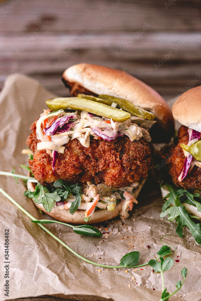 Spicy southern style fried chicken sandwich with coleslaw and pickles ...