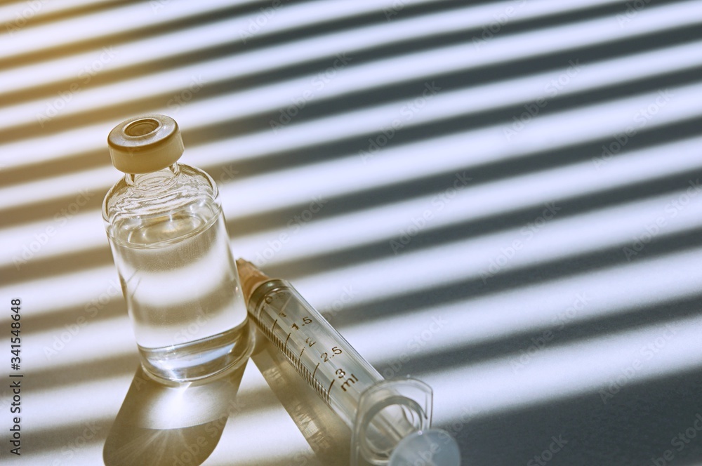 Medicine in vials and syringe , ready for vaccine injection , Cancer ...