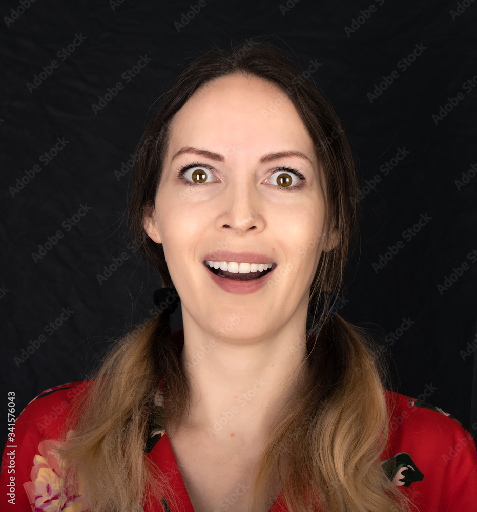 Emotion. Closed woman face with facial expressions over black ...