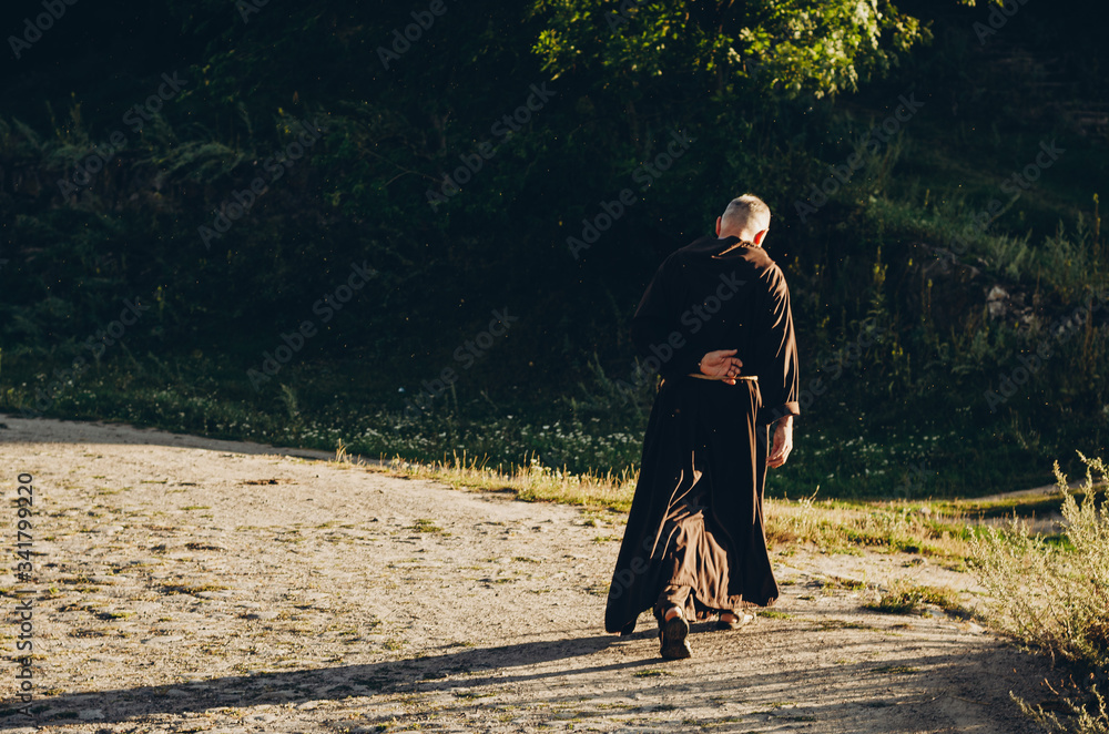 Catholic monk of the Capuchin Order, an adult wise man with a beard and ...
