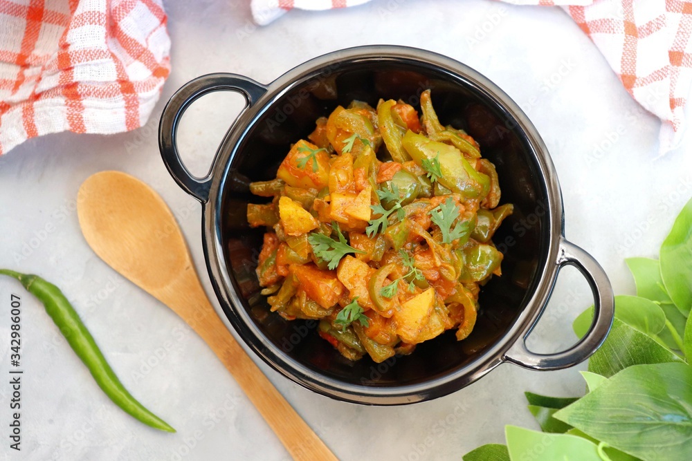 Indian food - Spicy Capsicum and potato stir fried with Indian spices ...