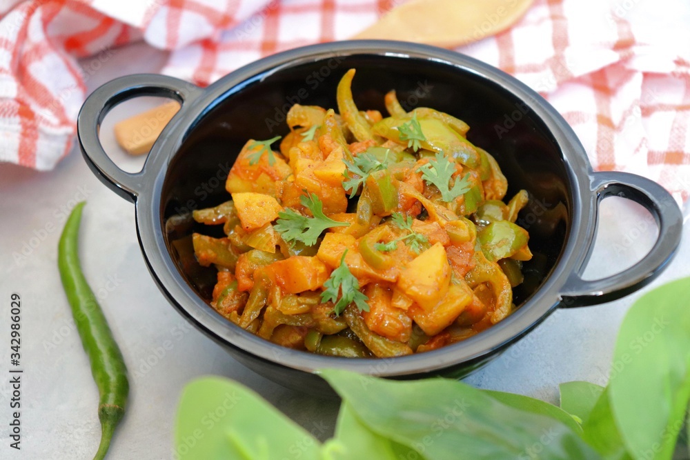 Indian food - Spicy Capsicum and potato stir fried with Indian spices ...
