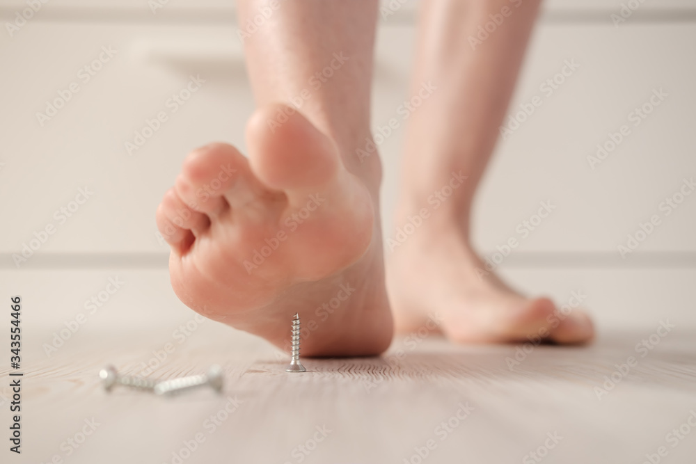 Bare feet run the risk of stepping on an accidentally dropped screw and ...