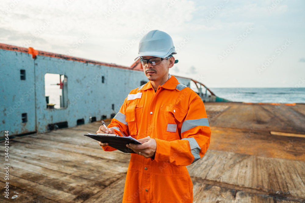 Filipino deck Officer on deck of offshore vessel or ship , wearing PPE ...