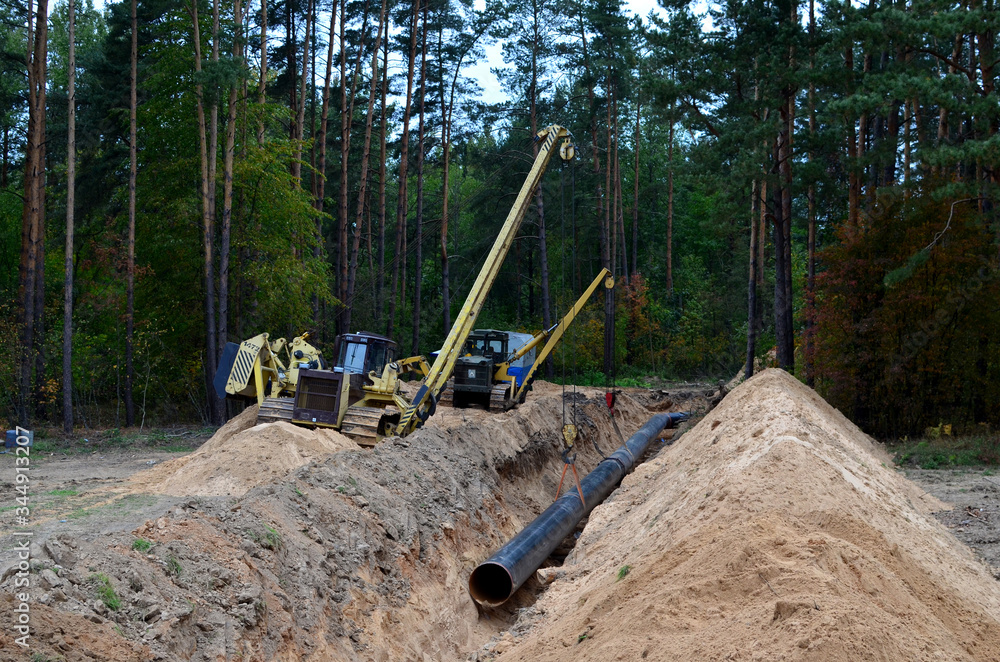 Photo Stock Natural gas pipeline construction work. A dug trench in the ...