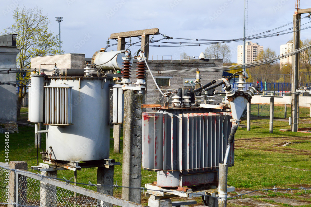 Large industrial iron metal transformer substation with transformers ...