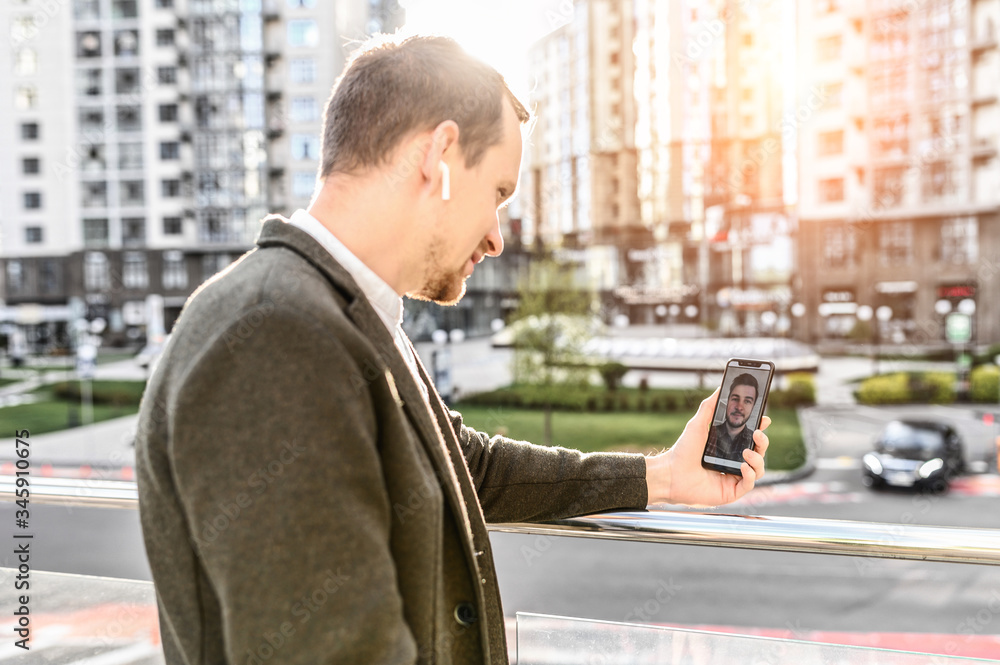 Communication via video call. Two men have distance business meeting by ...