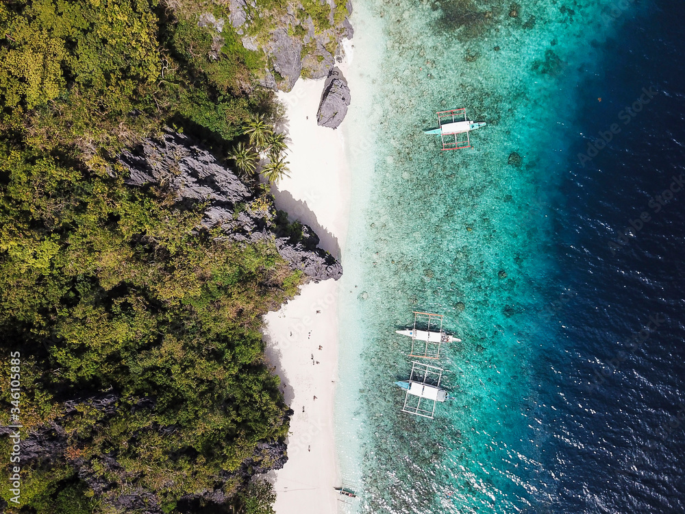 Overhead aerial of Entalula Beach, El Nido, Palawan. A secretive ...