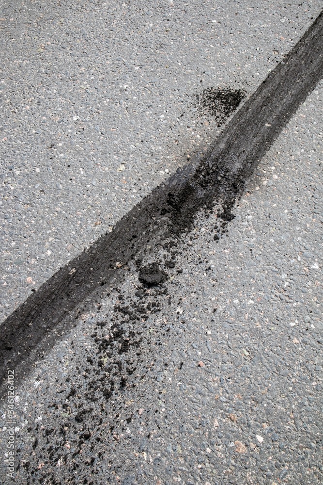 car tyre skid marks on road Stock Photo | Adobe Stock