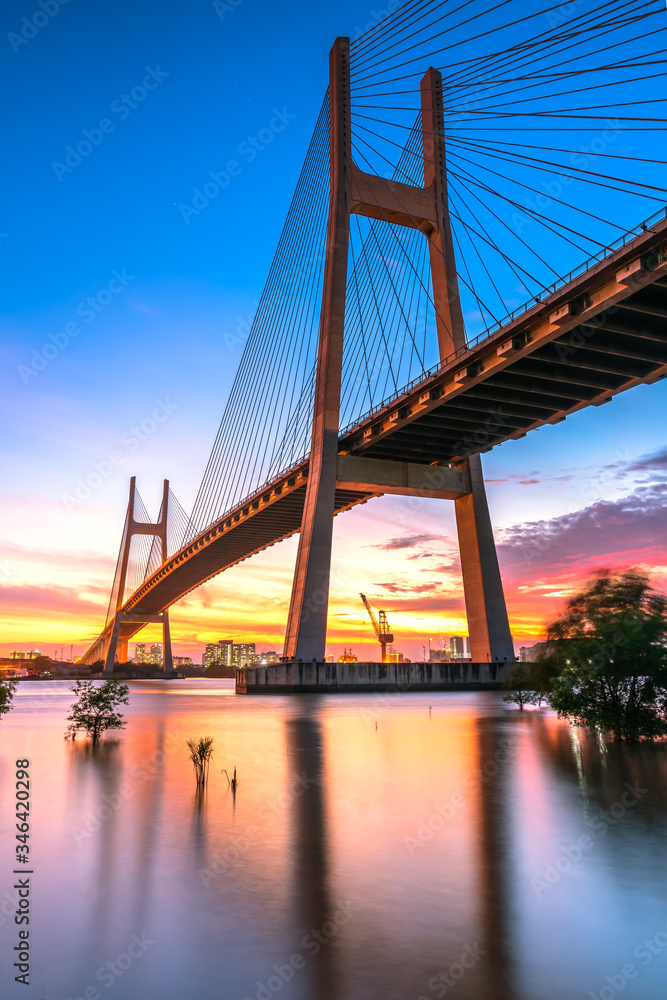 Beautiful sunset landscape at Phu My Bridge. This largest cable-stayed ...