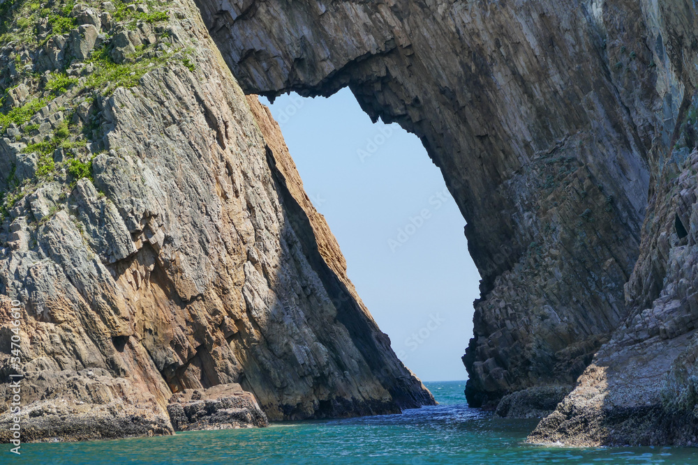 Huge hexagonal columnar joints of volcanic rock at Hong Kong Global ...