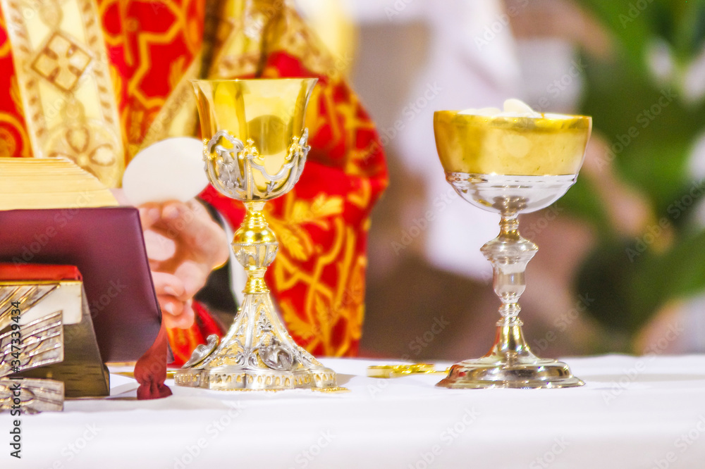 chalice with wine, blood of christ, and pyx with bread, body of christ ...