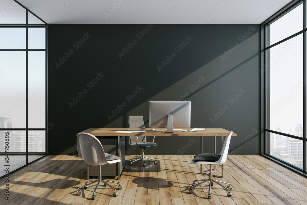 Modern coworking office interior with computer on desktop Stock Photo ...