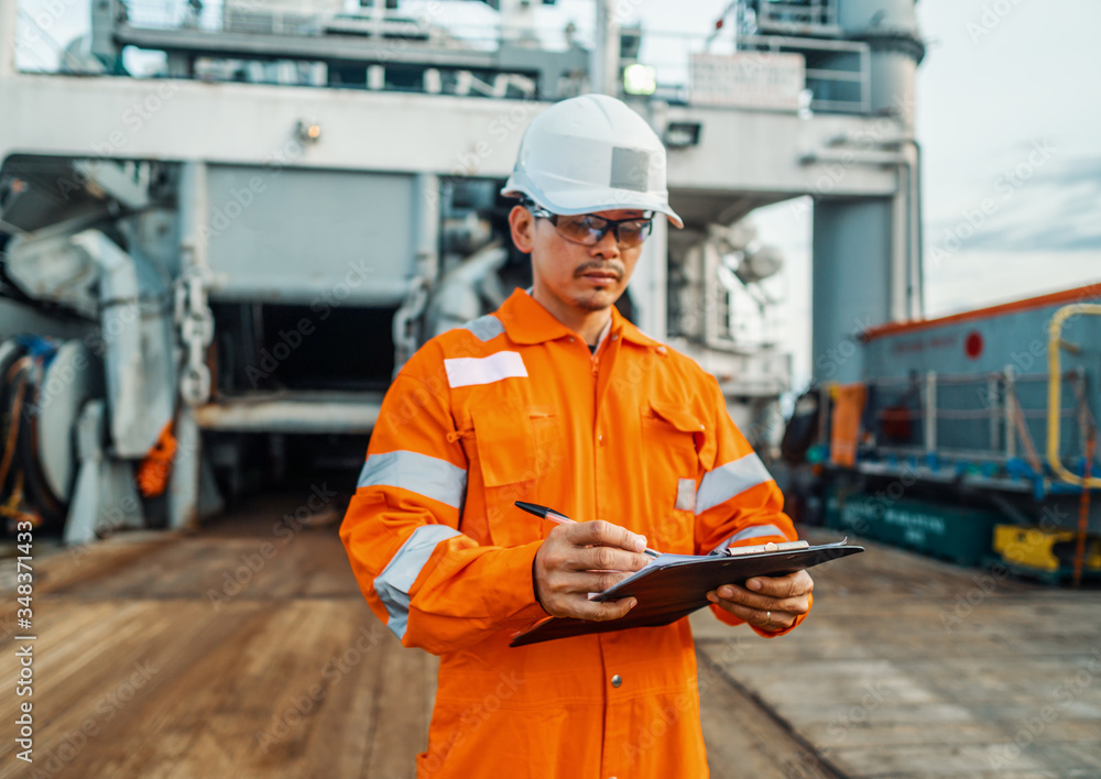 Filipino deck Officer on deck of offshore vessel or ship , wearing PPE ...