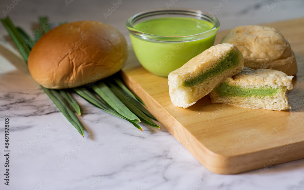 Fusion food of bakery and Thai dessert. Pandan Custard Bread. Soft ...
