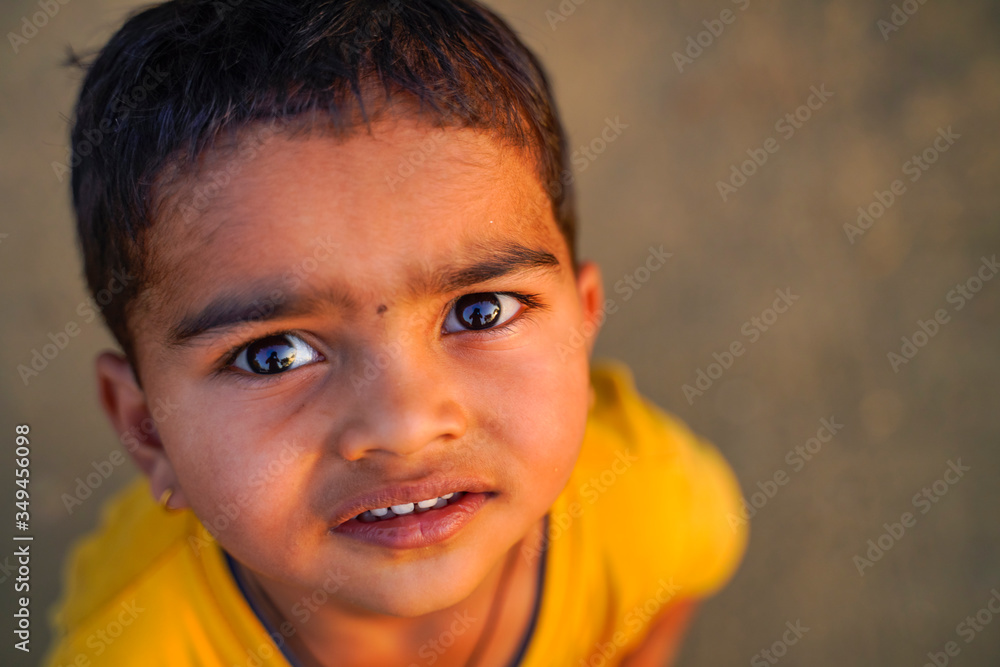 Indian Child Playing in outdoor Stock Photo | Adobe Stock