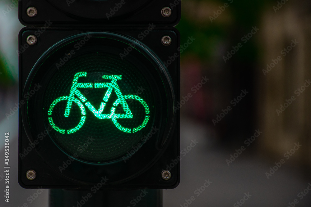 Sustainable transport. Bicycle traffic signal, green light, road bike ...